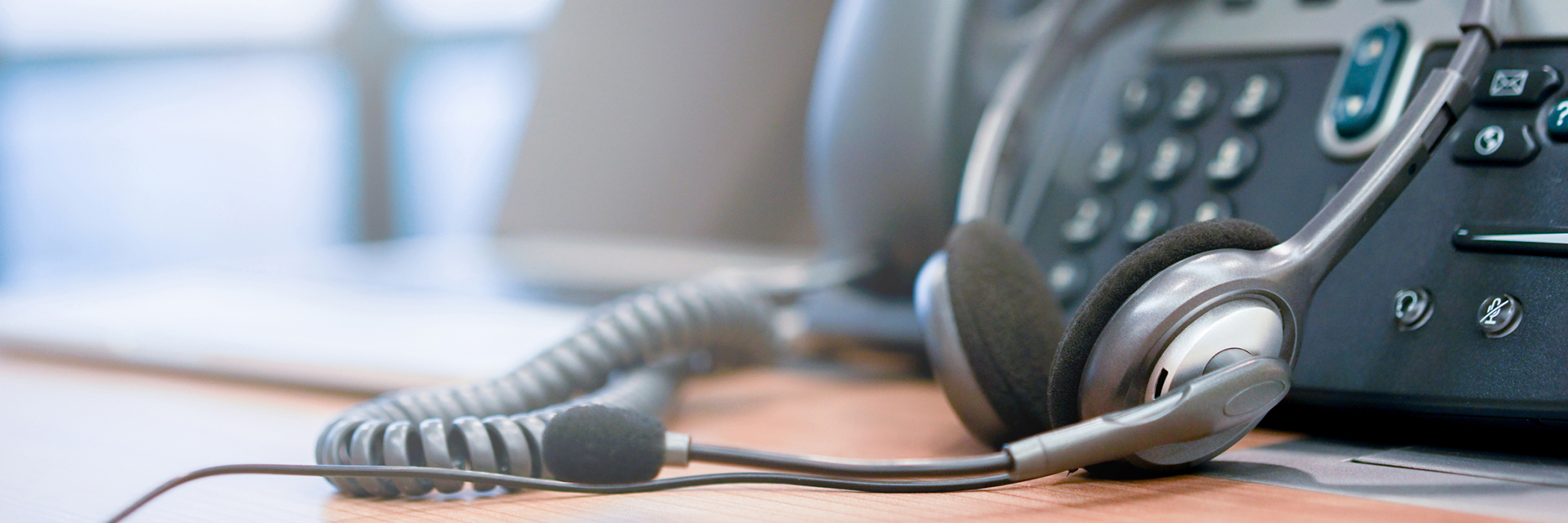 close up focus on call center headset device at VOIP system hanging on ...
